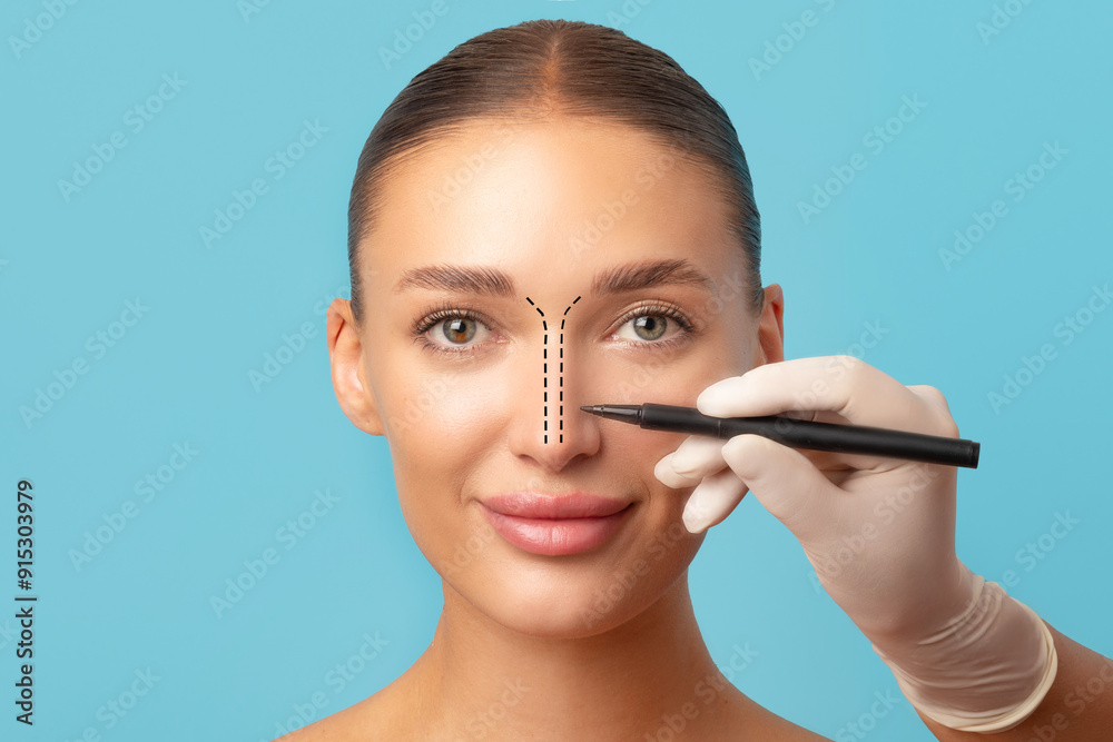 Woman preparing for rhinoplasty operation, doctor surgeon drawing ...