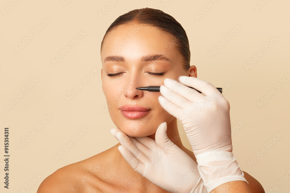 Facial plastic surgery concept. Doctor surgeon holding pen and ready to ...