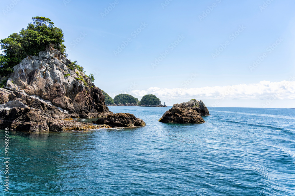 Dramatic rock formations on the coast of Pacific Ocean in Nachikatsuura ...