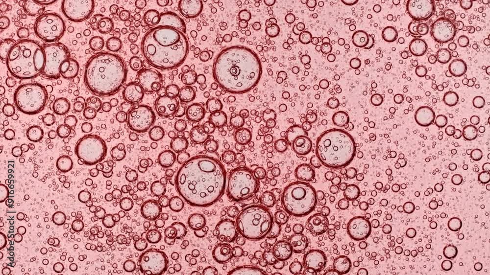 Transparent Bubble cluster, cells under a microscope. Cosmetic gel ...