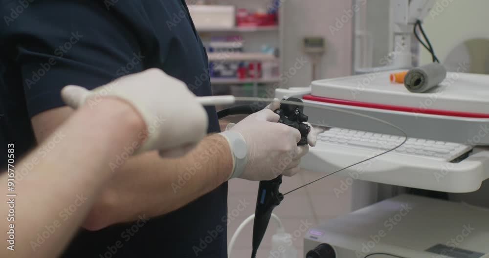Taking a biopsy during an endoscopic examination. Close-up of the ...