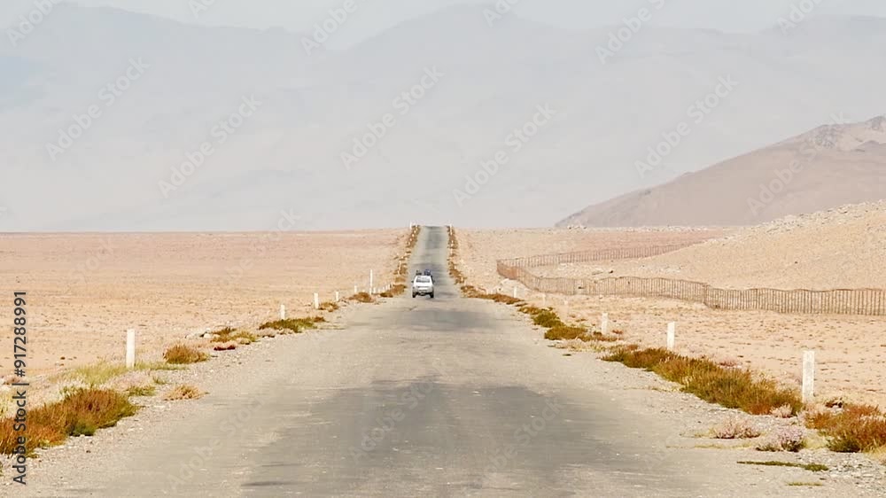 Static view 4wd vehicle drive on popular the M41 asphalt road or Pamir ...