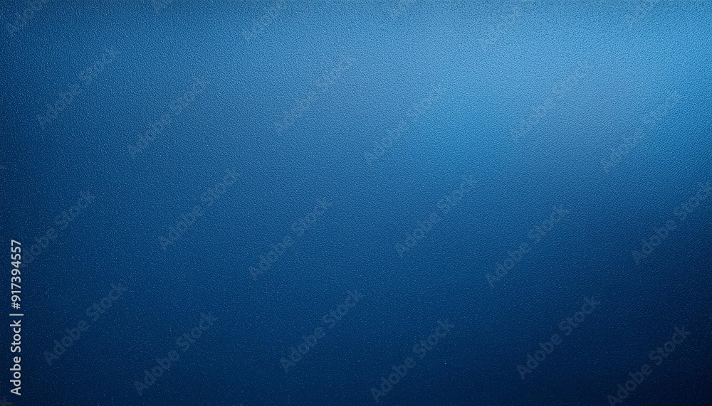 textured grainy surface with a dark to light blue gradient background ...
