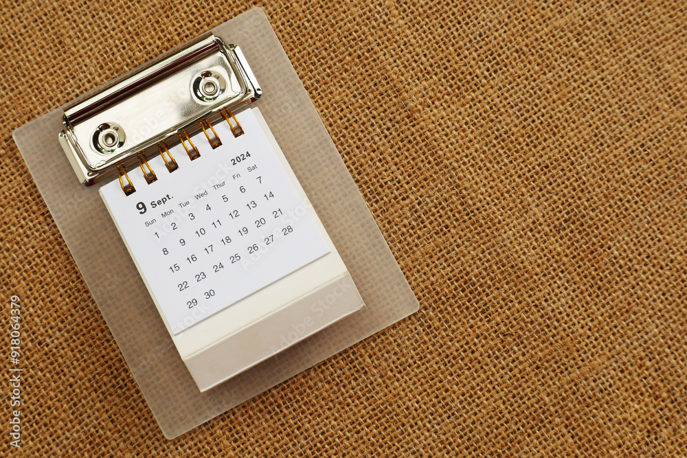 Mini calendar pages for each month, September 2024 on burlap Stock ...