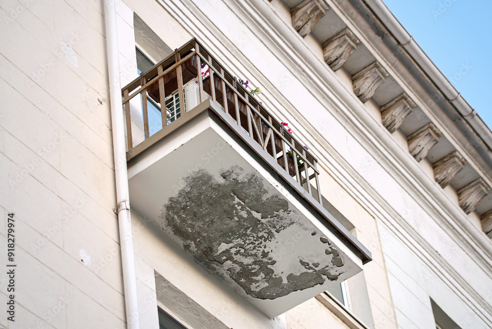 Old balcony needs for repair, plaster chunks fall off. Balcony and ...