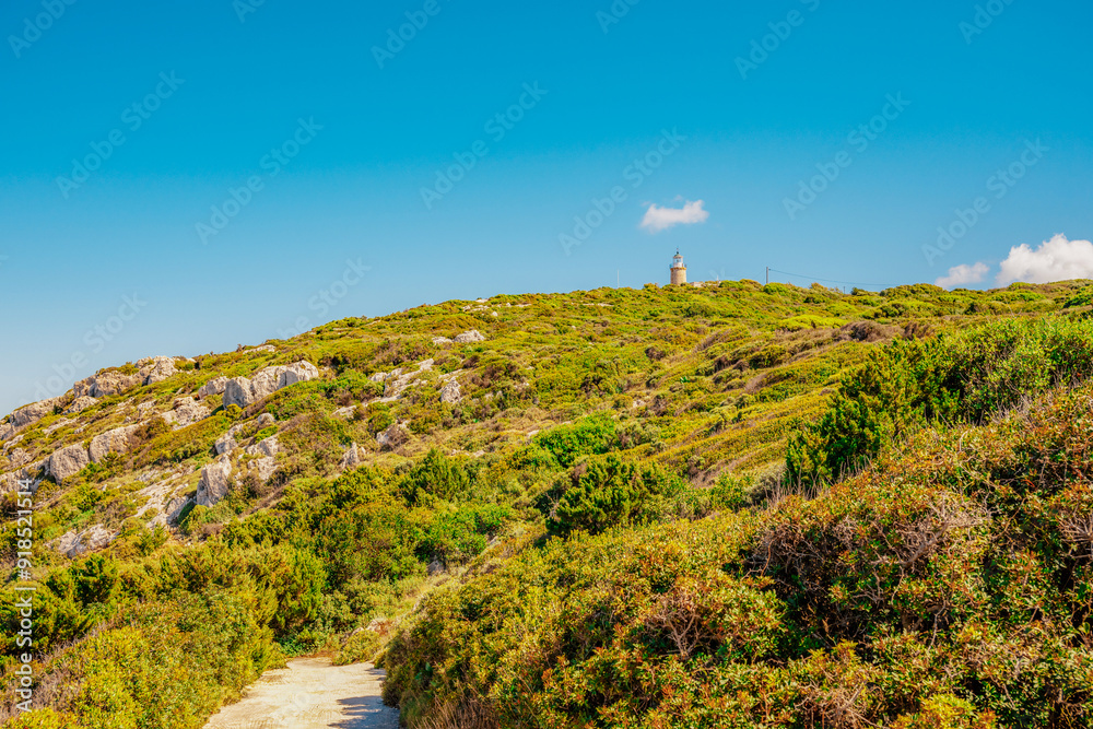 Skinari Lighthouse at the northern cape of Zakynthos island in Greece ...
