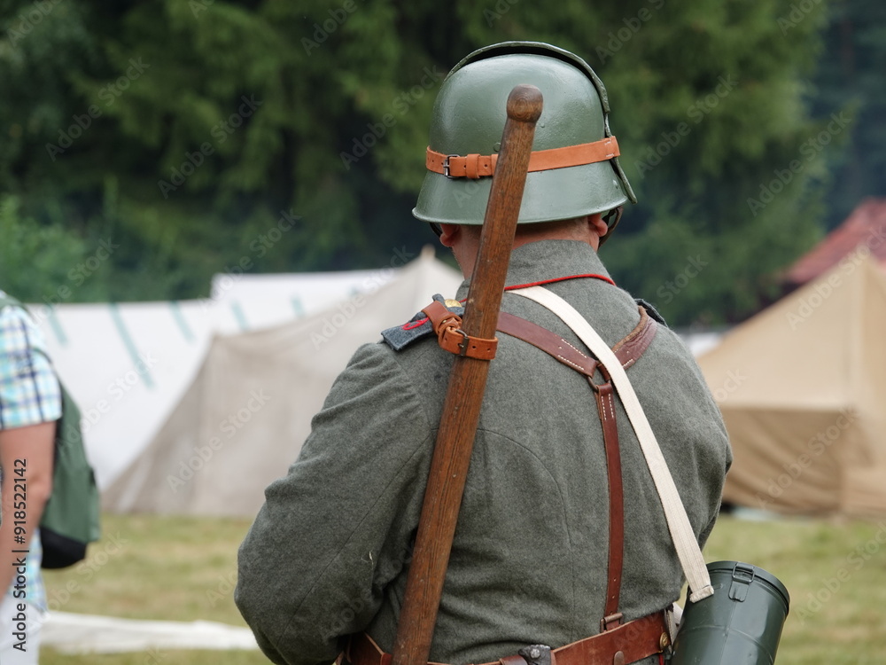 Dark green metal helmet of a WWI and WWII German soldier with armored ...