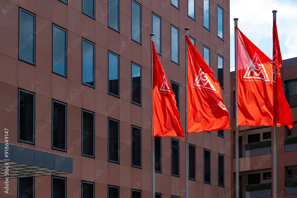 Red IGM flags IG Metall logo, German dominant metalworkers union on ...