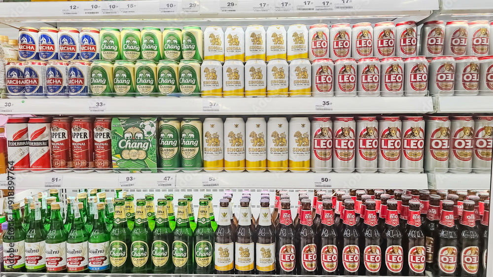 Thai beer on supermarket shelves. Various brand of beer and alcohol ...