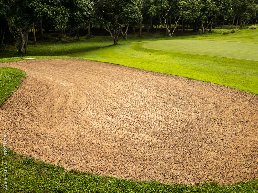 Golf Course Sand Pit Bunkers, green grass surrounding the beautiful ...