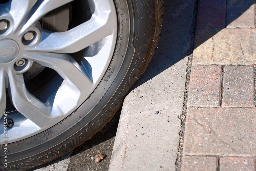 Minsk, Belarus. Aug 11, 2024. Car tire NEXEN Roadian HTX touching curb ...