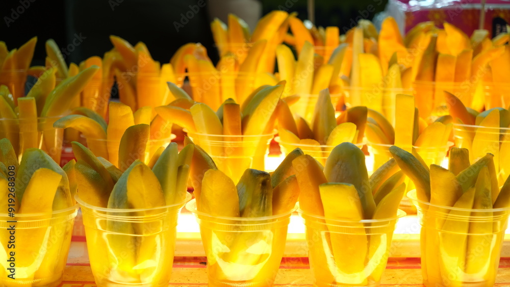 Rujak Mango in a plastic cup, is one of the typical snacks of mangoes ...