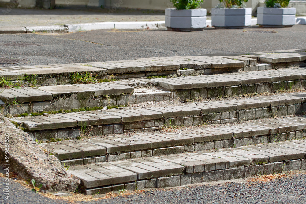 Damaged stair steps made from paving slab unsafe for pedestrians ...