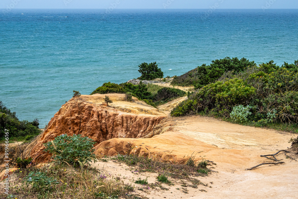 Praia da Marinha Beach among rock islets and cliffs seen from Seven ...