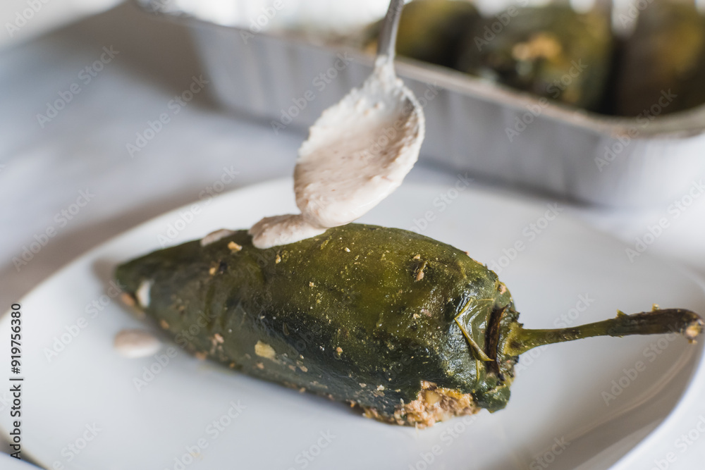 Preparation of the famous chiles en Nogada, traditional Mexican food in ...