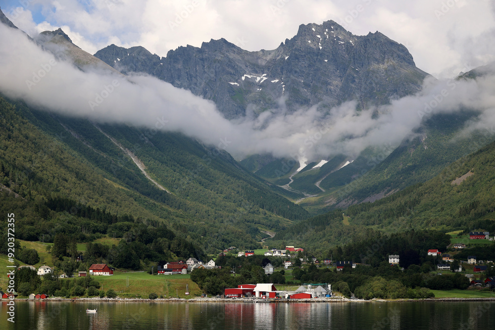 Hjorundfjord with a view of the breathtaking Sunnmore Alps, one of ...