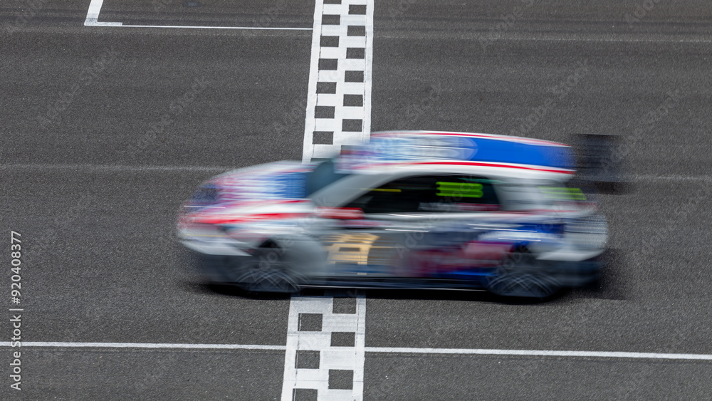 Motion blur race car racing on speed track, Car race on the ...