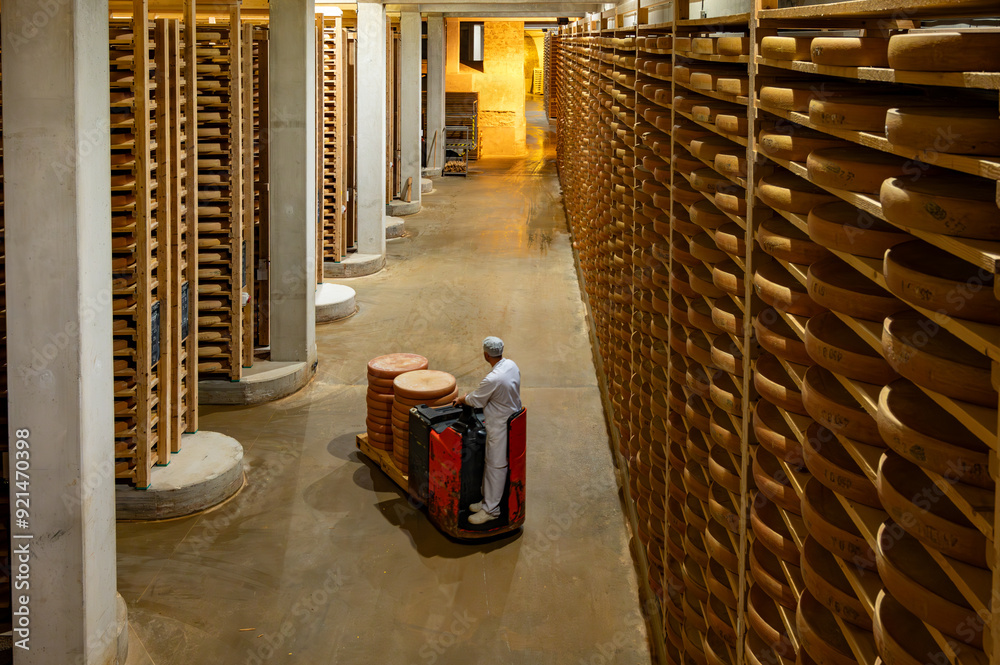 Aging rooms with shelves in cheese caves, central location for aging of ...