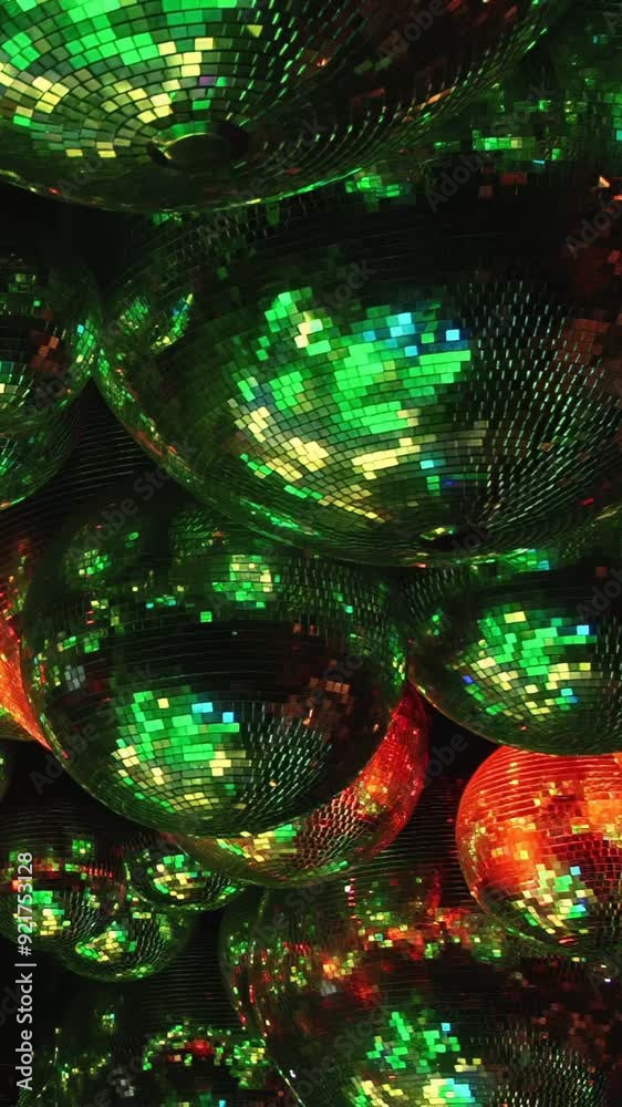 Dynamic light show with digital spheres in red, blue, and yellow ...