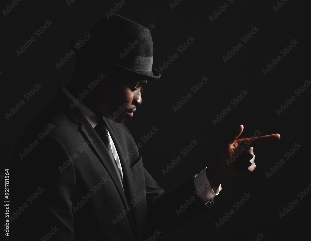 Black man, finger gun and fashion suit in dark background for agent ...