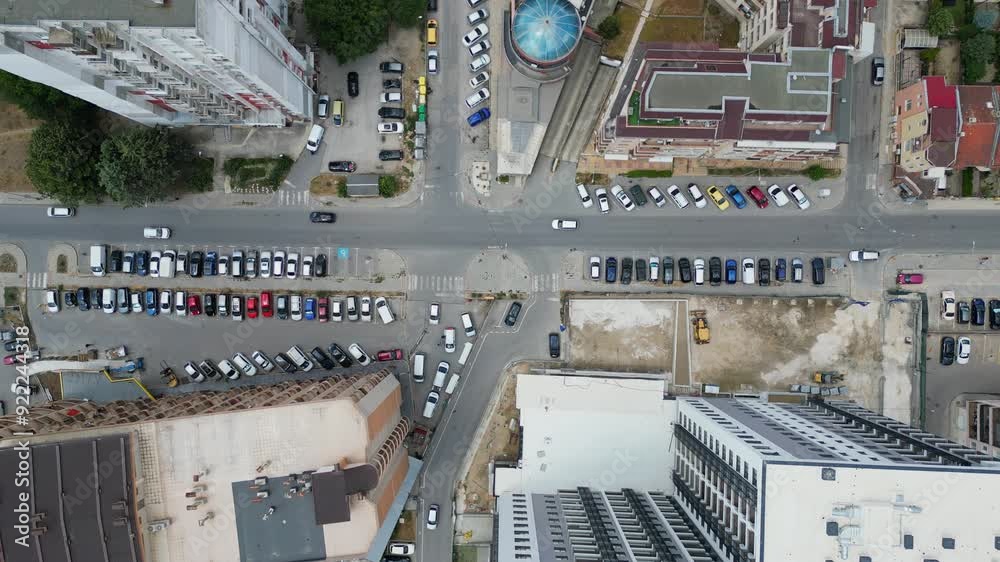 Top-down view of a city block with residential buildings, green spaces ...