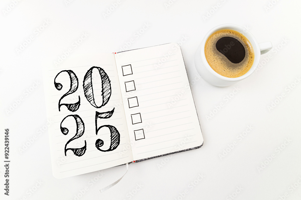 New year resolutions 2025 on desk. 2025 goals list with notebook ...