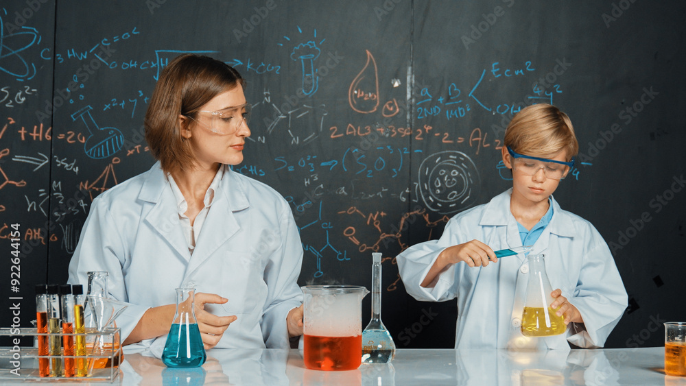 Caucasian teacher explained about colored solution at science ...