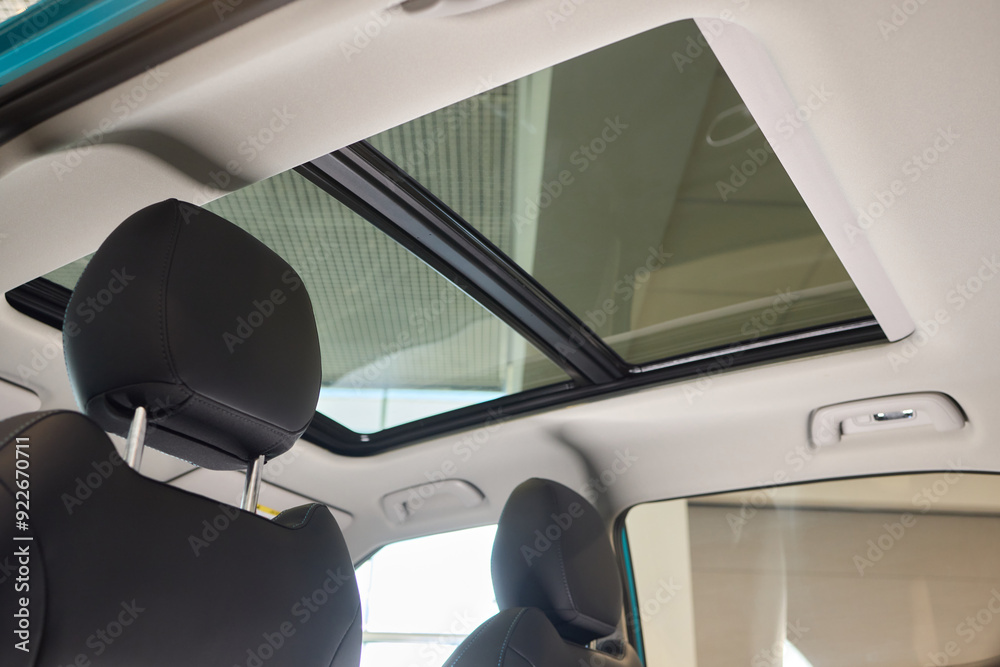The interior design of a modern car sunroof incorporates sleek ...