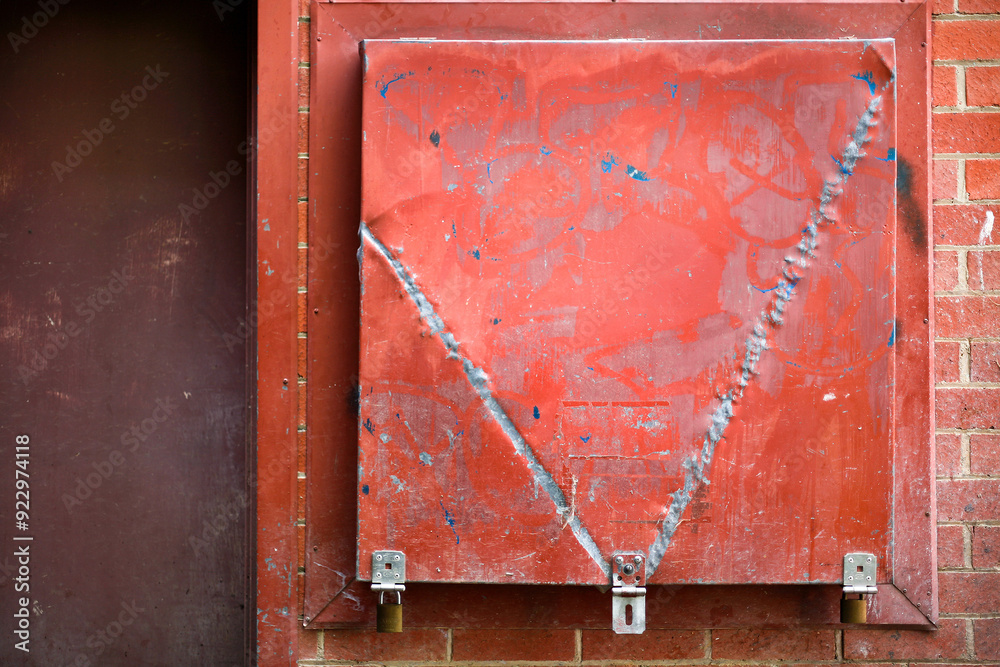 Beat up metal box mounted to the exterior wall of a building Stock ...