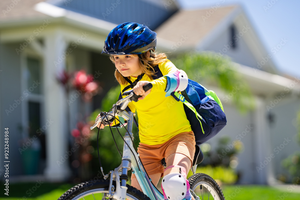 Little kid boy ride a bike in the park. Kid cycling on bicycle. Happy ...