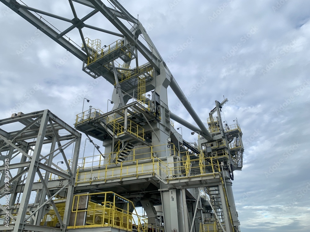 Stacker Reclaimer chain bucket on power plant project. The photo is ...