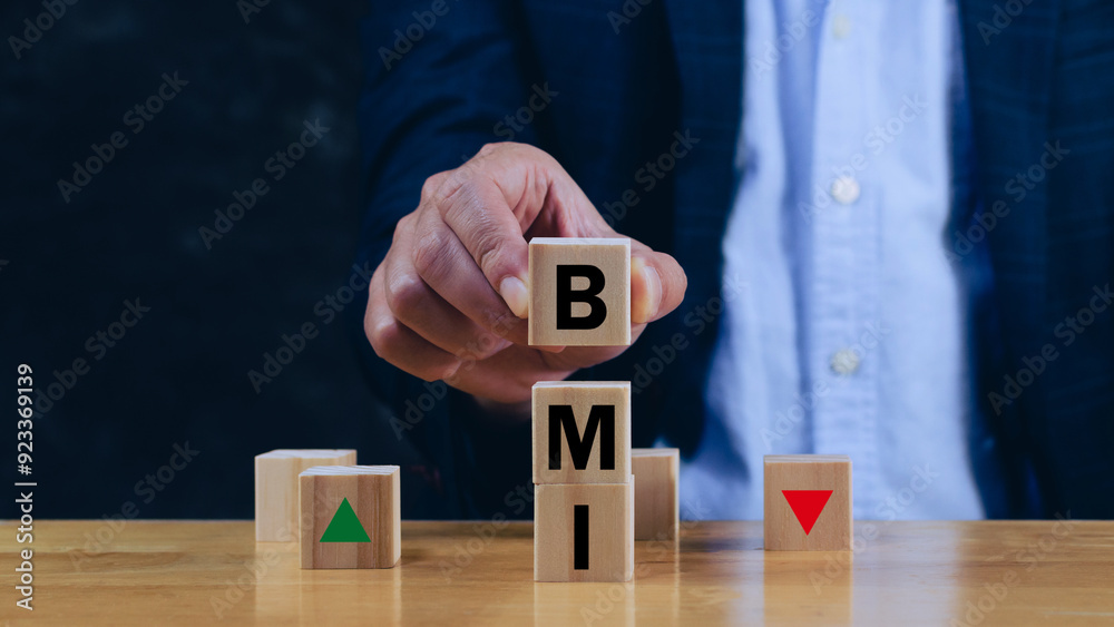 BMI big mac index symbol, Concept words BMI big mac index on wooden ...