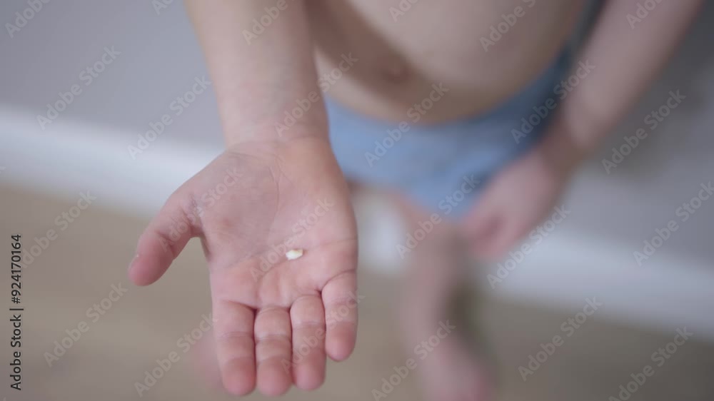 Boy shows fallen tooth on palm child development childhood growth and ...
