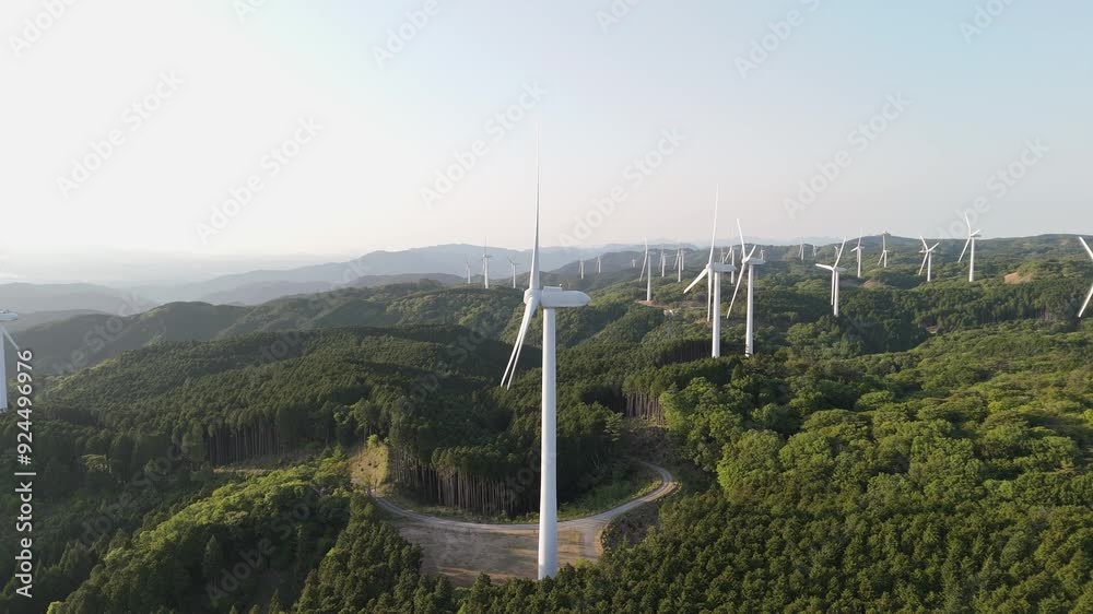 A cluster of wind turbines for generating electric power in a valley ...