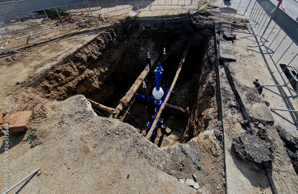 pipe repair for a crash. connection of new pipes by plumbers and water ...