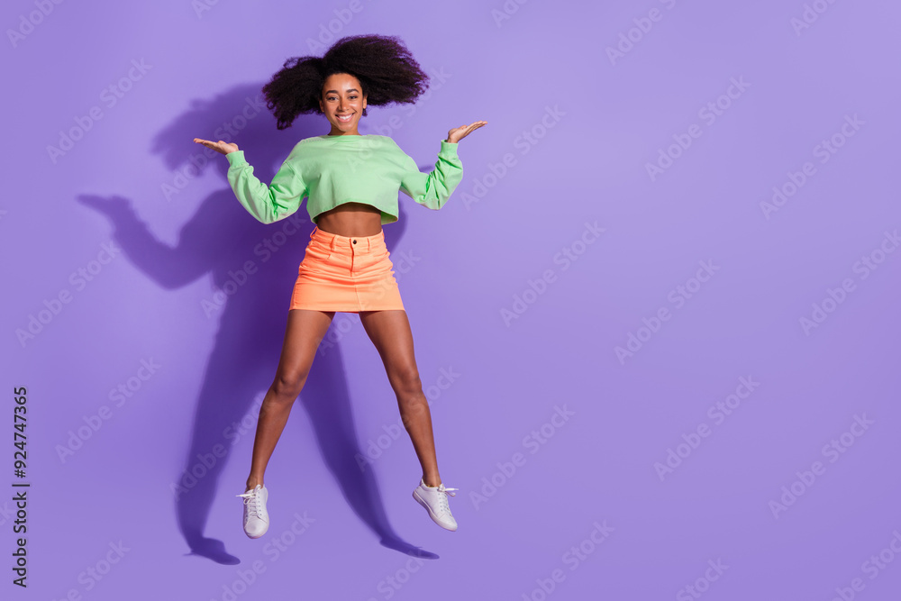 Full body length photo of young funny jumping girl with wavy hair ...