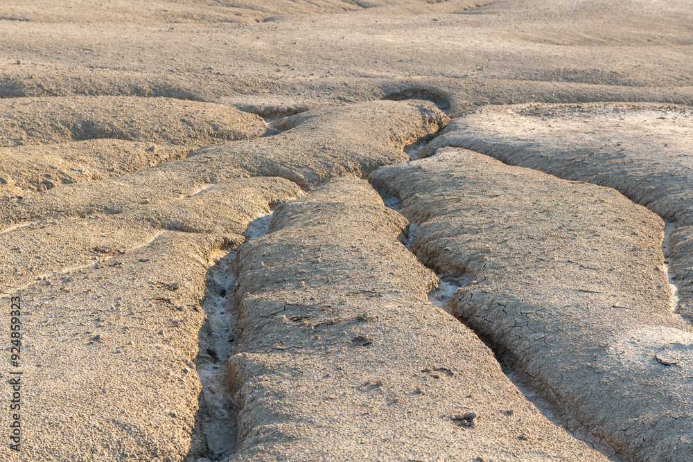 Arid landscape with mud rivers formations in Romania. This is a unique ...