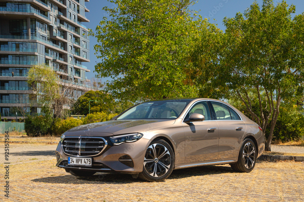Mercedes-Benz E180 is a mid-sized sedan featuring a sleek design and ...