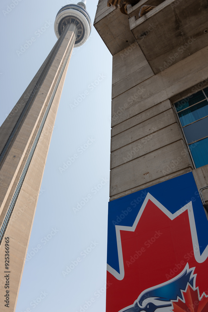 skyward view of CN Tower, a landmark tourist attraction and Rogers ...