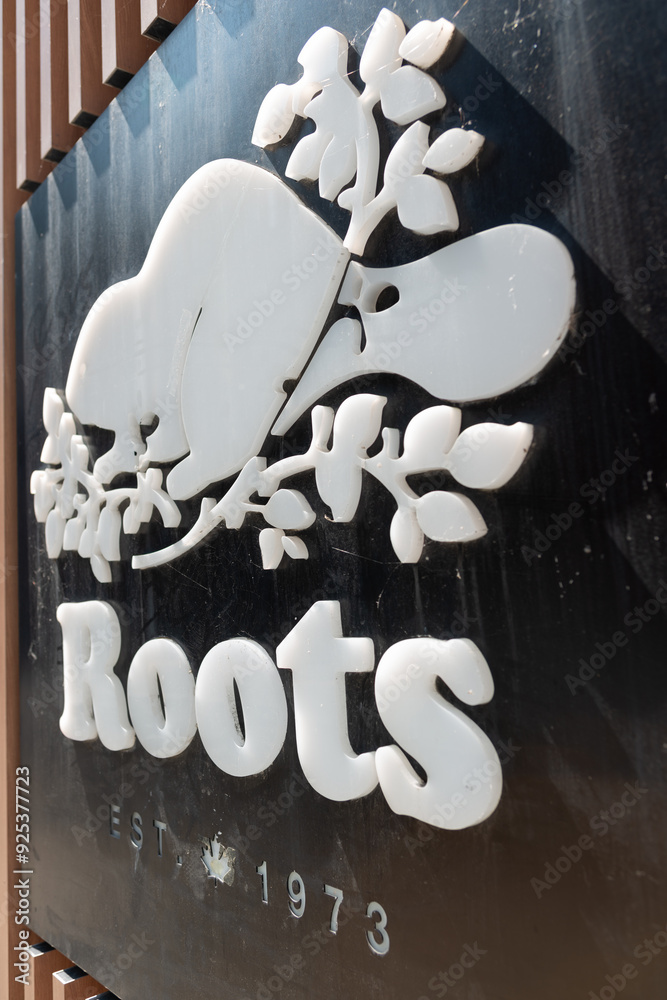 logo sign of Roots, a clothing store chain, located here at 220 Yonge ...