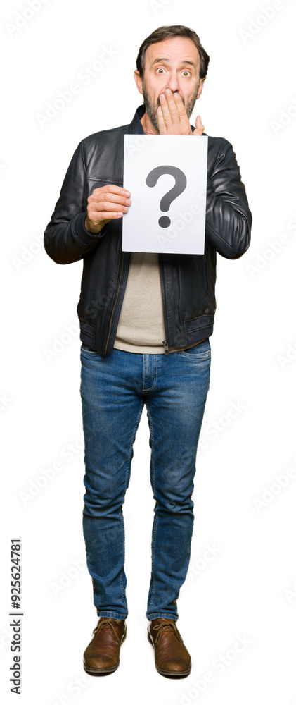 Handsome middle age man holding paper with question mark cover mouth ...