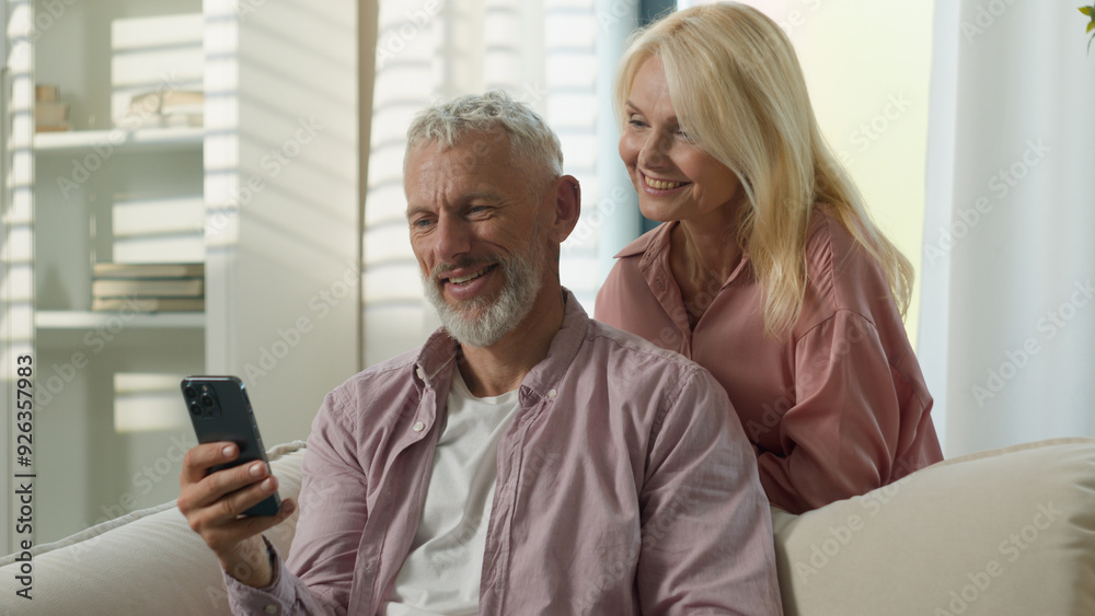 Cheerful Caucasian old senior elderly couple family talking mobile ...