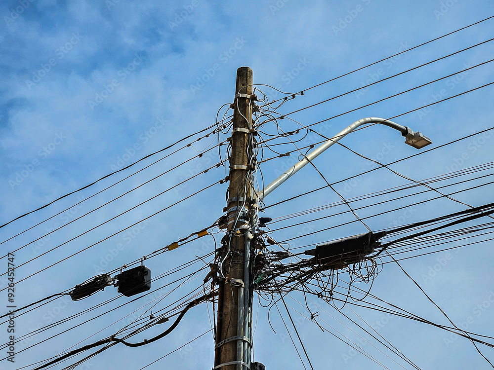 Street light with electricity utility pole and electrical wires, low ...