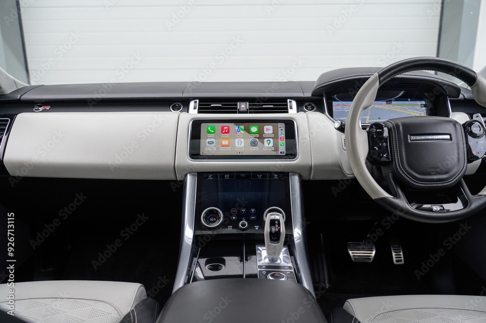 Clean and Sleek Interior with Focus on CarPlay in Range Rover SVR Cream ...