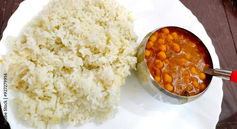 Chickpeas masala with rice - Chole masala curry and cooked plain white ...