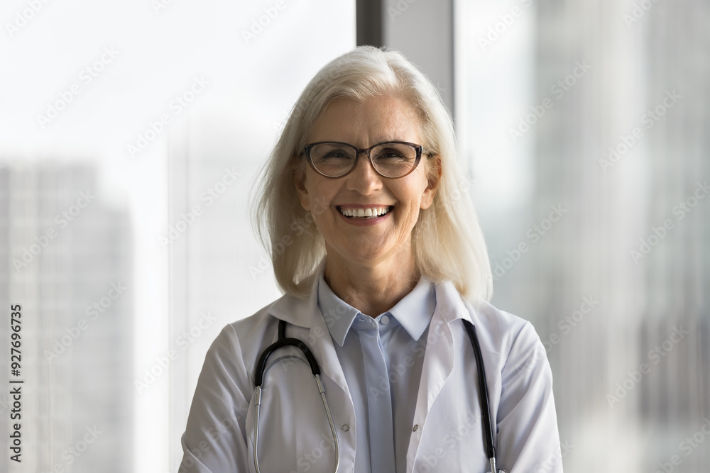 Head shot profile picture of smiling older female doctor wear white ...