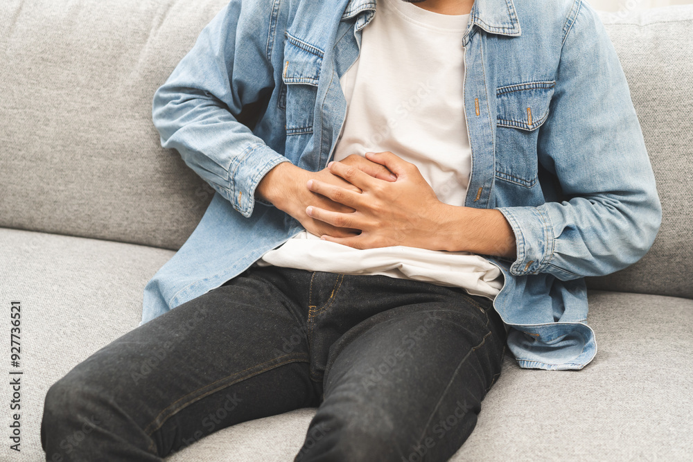 Flatulence ulcer, hurt suffer asian young man, male hand in belly ...