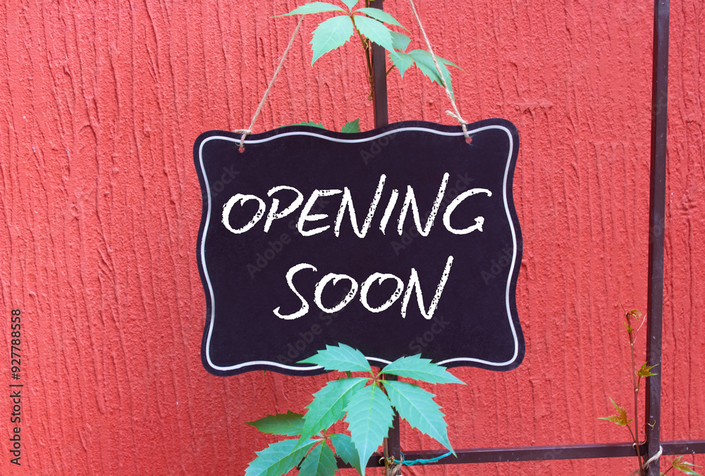 Opening soon symbol. Concept word Opening soon on black chalk ...