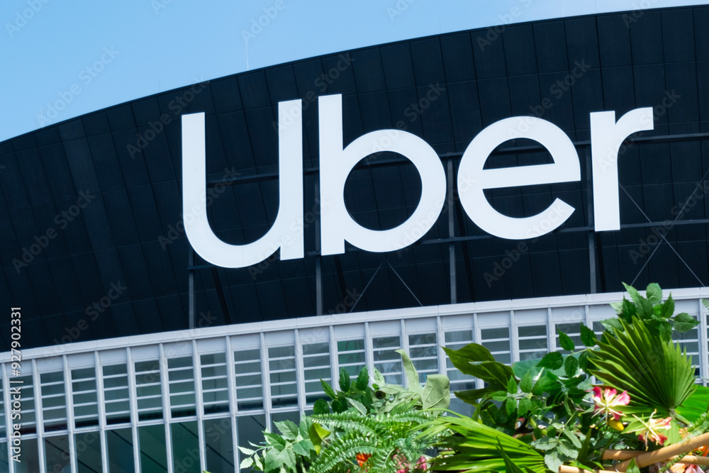 Uber Eats Music Hall Advertising logo on modern building facade, fusion ...