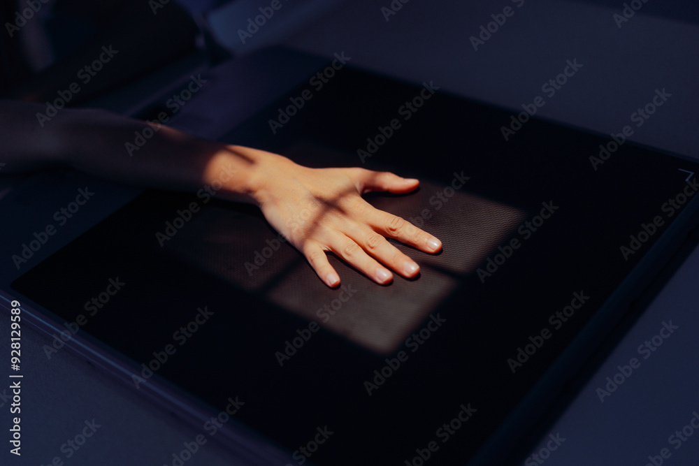 Adult Hand on X-Ray Table with Lights on Ready for Scanning. Patient ...